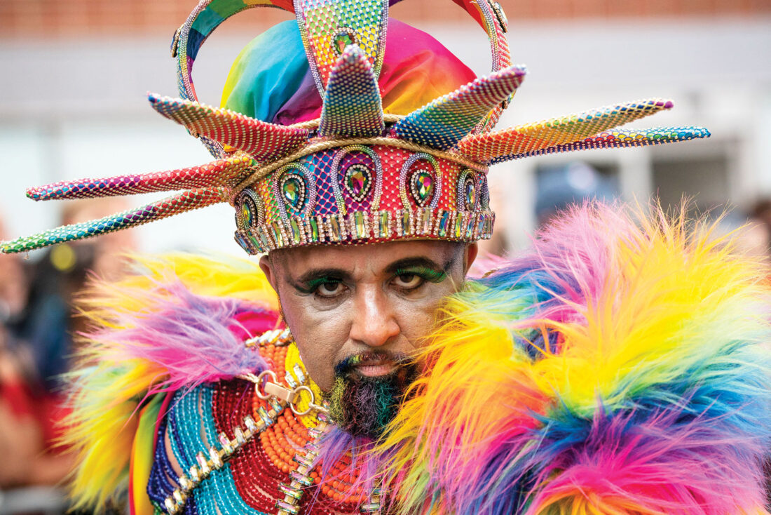 Out and About It: LGBTQ+ Pride revelers flash feathers, flags from New ...